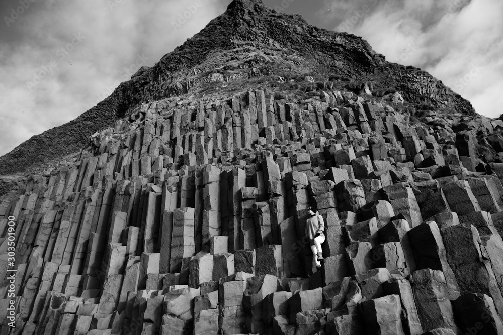 Image of black sand beach near Vik at South Coast of Iceland. White ...