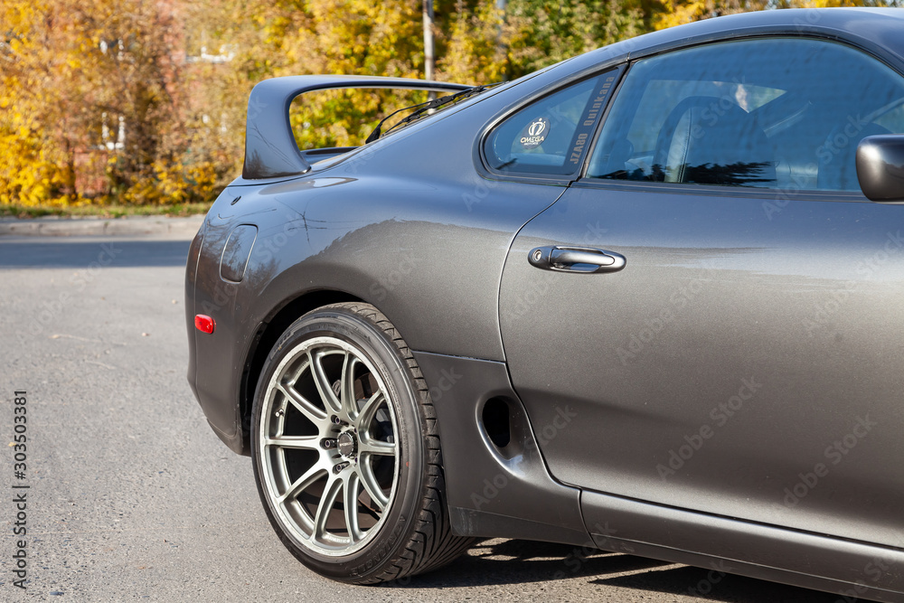 A very rare Japanese sports car in the back of a Toyota Supra coupe in ...