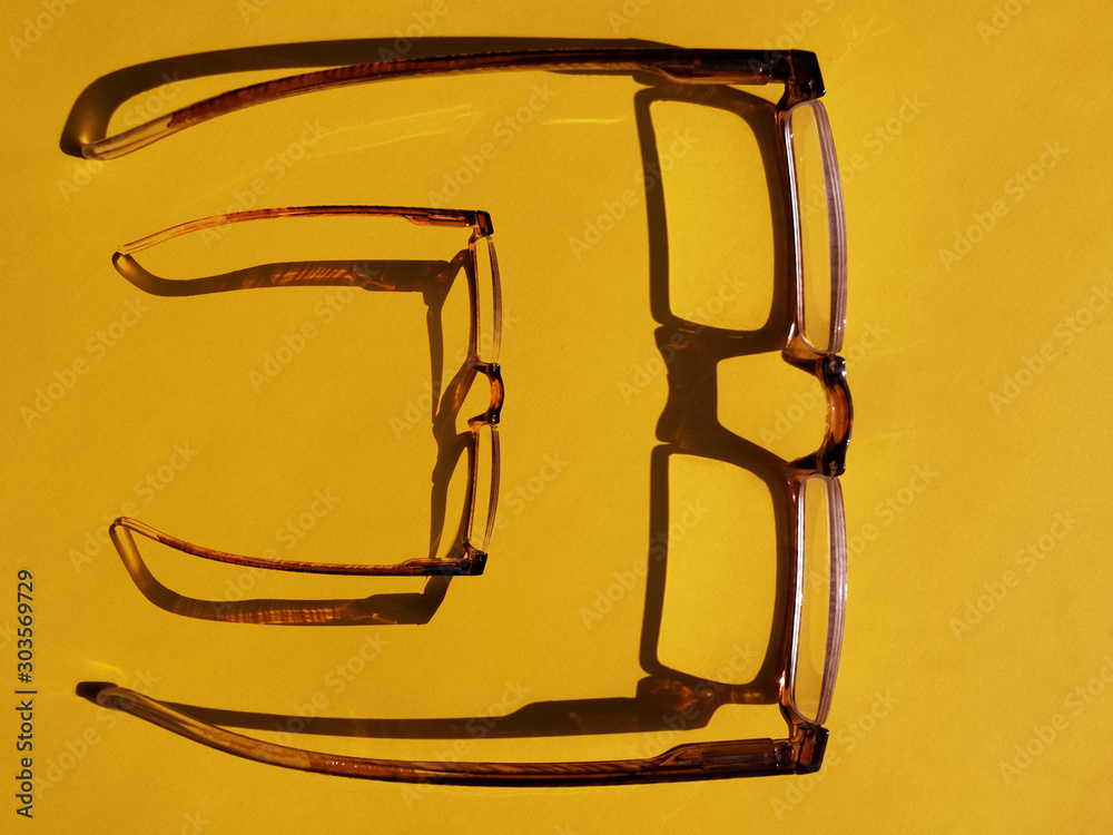 Collage photo of glasses. Spectacles of big and small size for adult ...