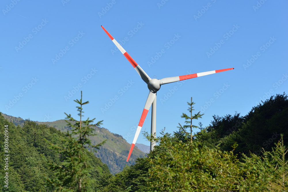 Windrad in den Alpen Stock Photo | Adobe Stock