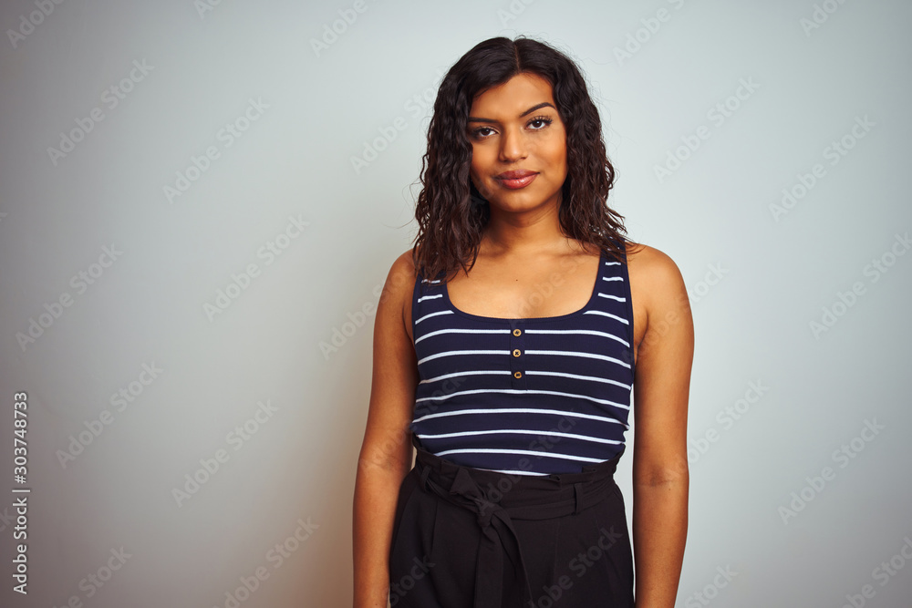 Transsexual transgender woman wearing striped t-shirt over isolated ...