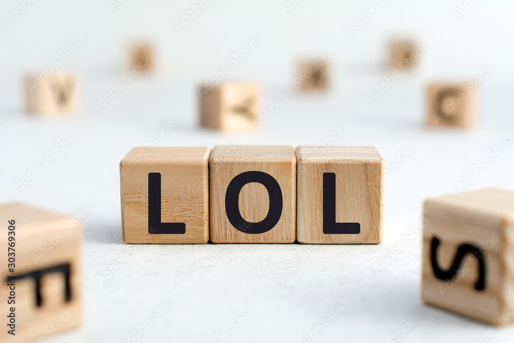 LOL - acronym from wooden blocks with letters, abbreviation LOL laugh ...