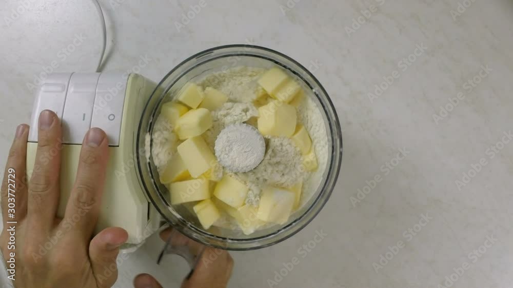 Combine butter and flour in food processor. Making dough in food ...