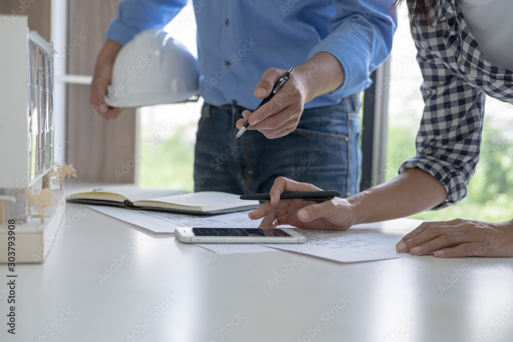 Engineer or architect teamwork working on construction project with ...