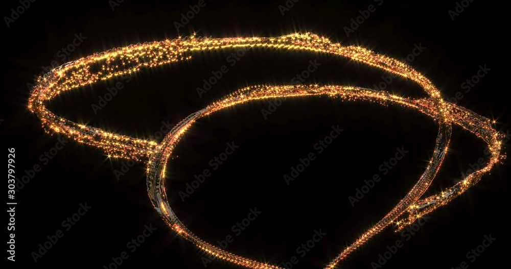 Yellow foamy beer is pouring with fine sprays on a black background ...