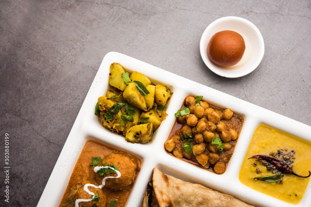 Indian vegetarian Food Thali or Parcel food-tray with compartments in ...