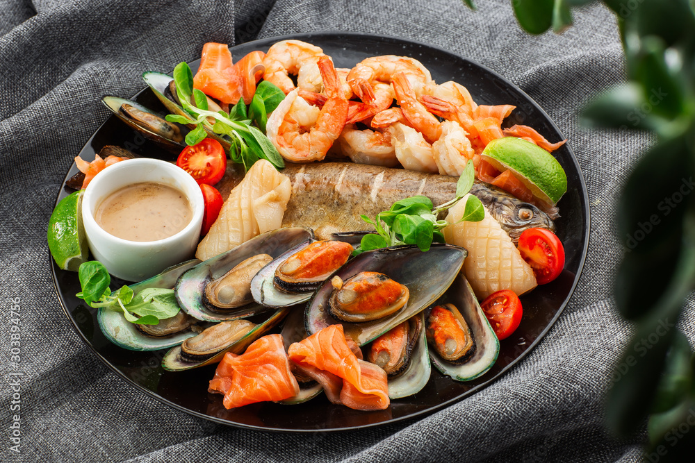 Roasted Mixed Seafood Contain Mussels, prawns, salmon, Calamari Squids ...