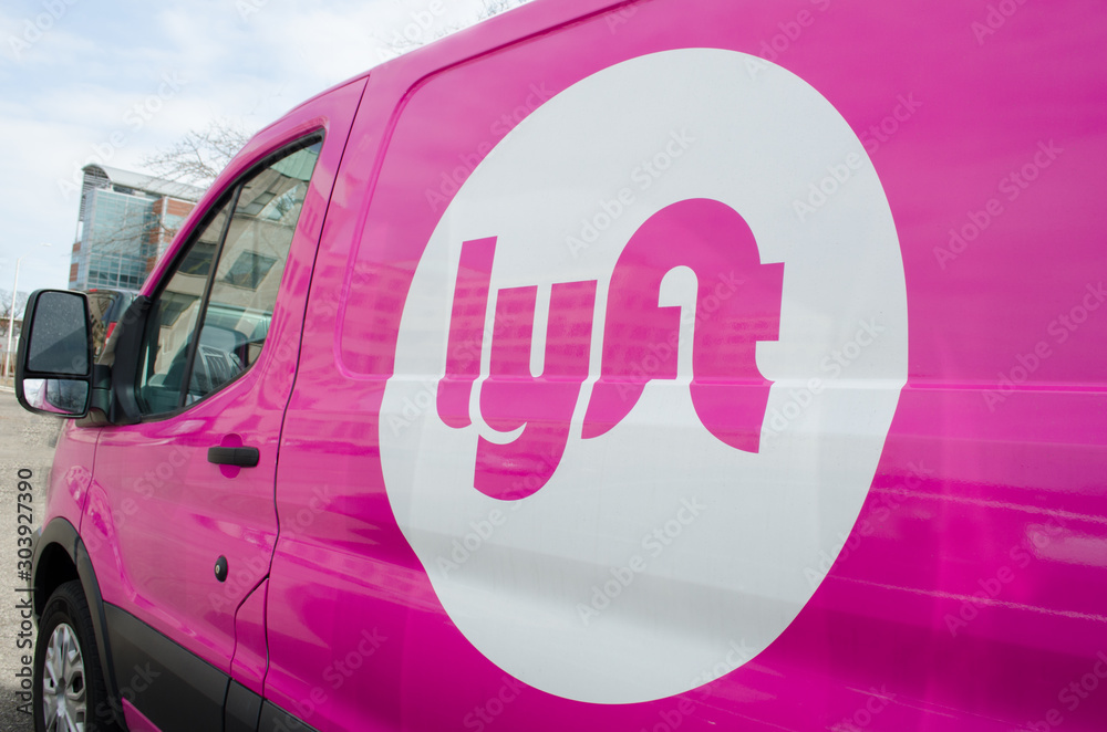 Detroit March 29th 2019 Lyft Van Sitting Outside The Lyft Office In detroit-march-29th-2019-lyft-van-sitting-outside-the-lyft-office-in