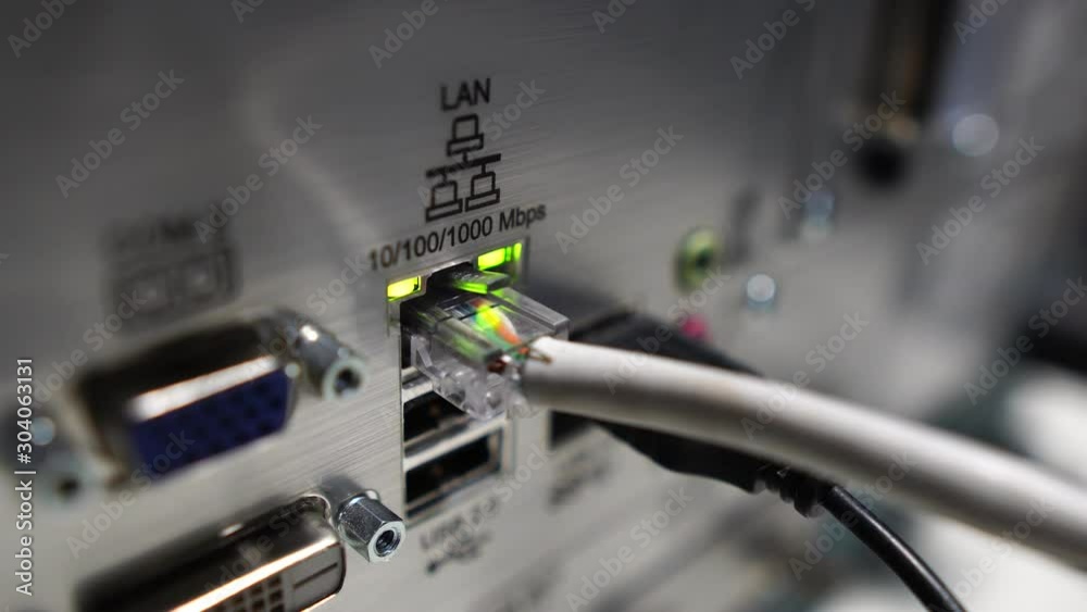 close-up of male engineers are connected to cable systems of ...