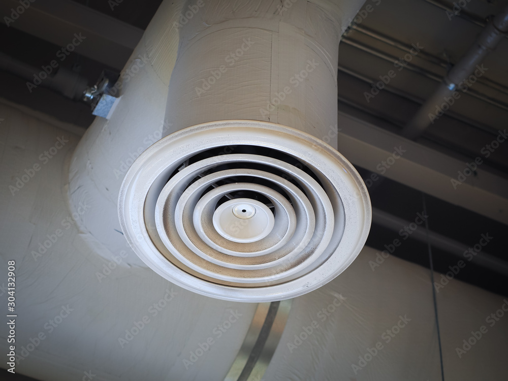 Air Ventilating tube installed on the ceiling of the office building ...