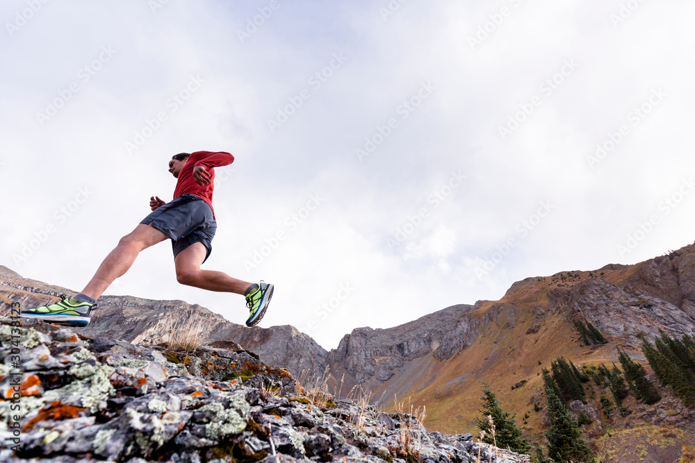 Gold King Basin, near Telluride, Colorado, USA: A male runner running ...