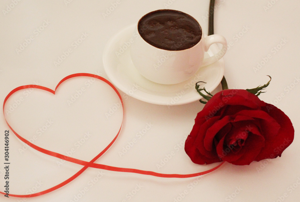 red and white roses. red rose in the hands of lovers. cup of coffee ...