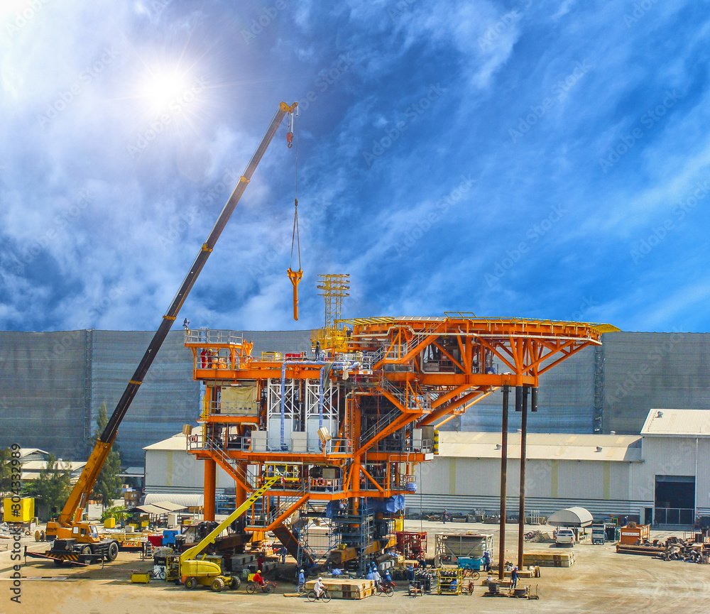 Oil rig platform during construction site in the harbor yard and ...