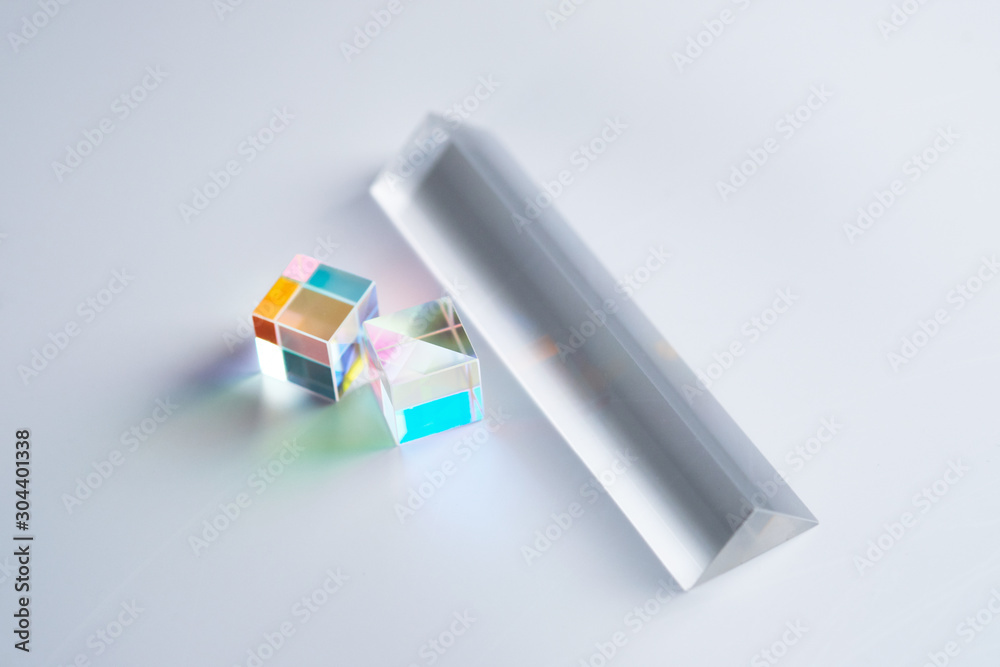 glass prism for refraction of light in optical experiments Stock Photo ...