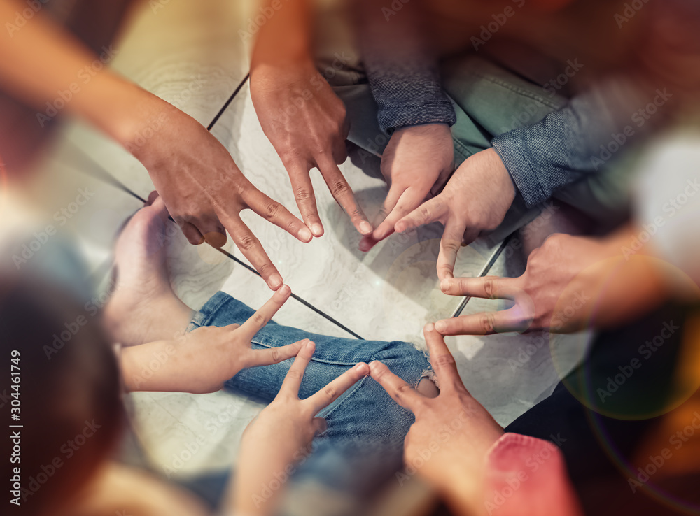 The abstract art design background of adult and children hands stacked ...