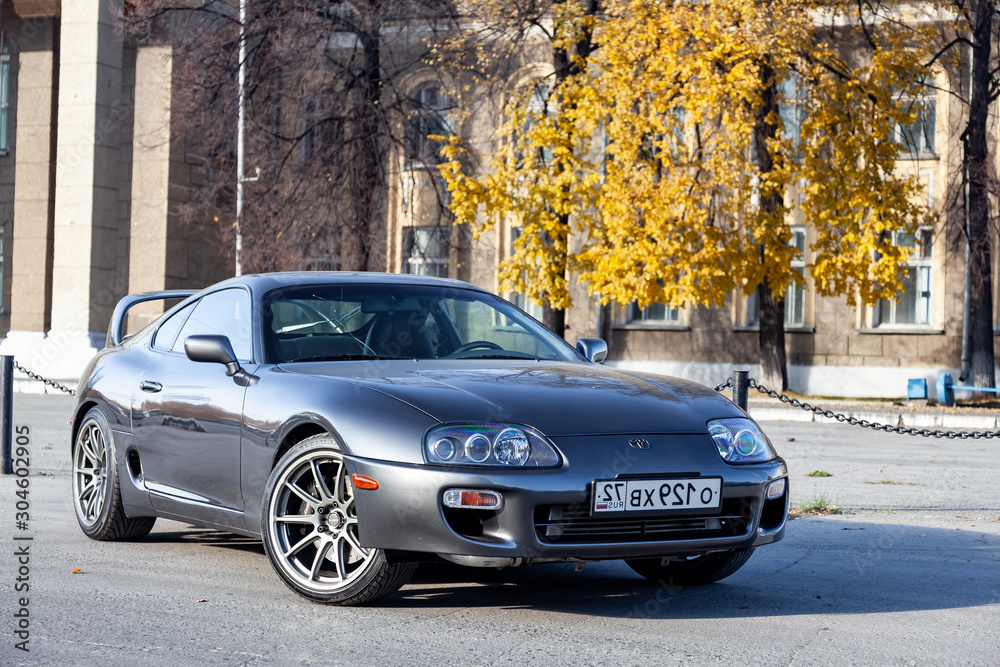 A very rare Japanese sports car in the back of a Toyota Supra coupe in ...