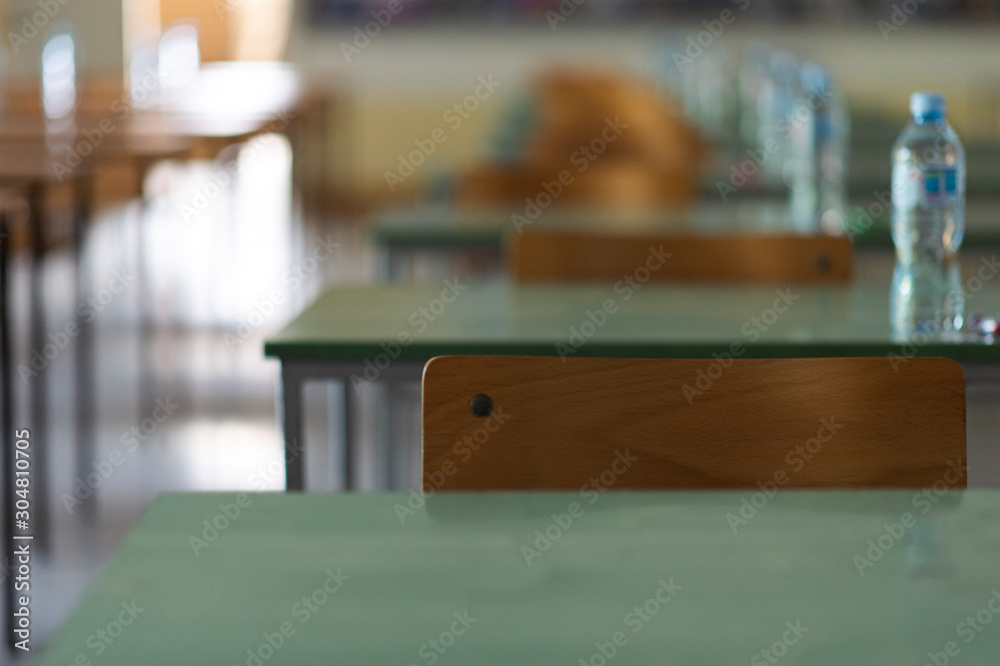 Exam examination room or hall set up ready for students to sit test ...