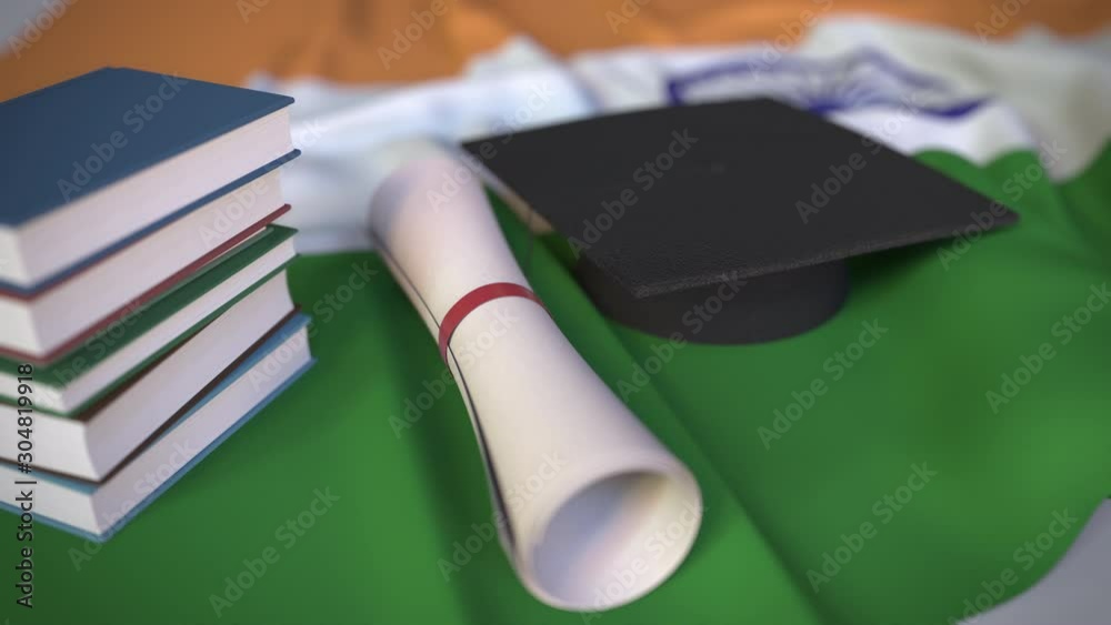 Graduation cap, books and diploma on the Indian flag. Higher education ...