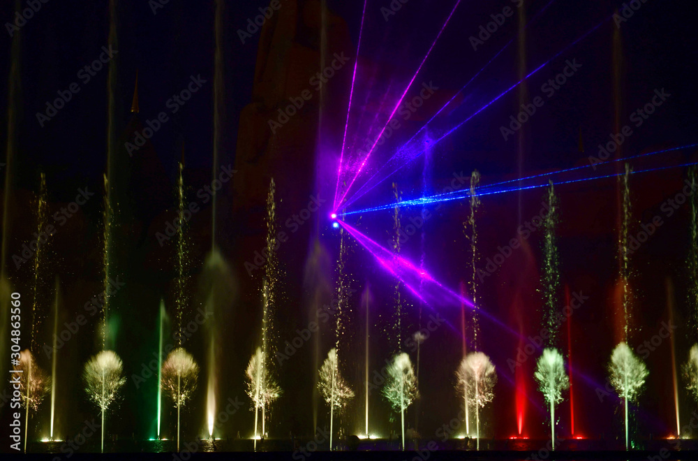 Colorful water fountains. Beautiful laser and fountains show. Large ...