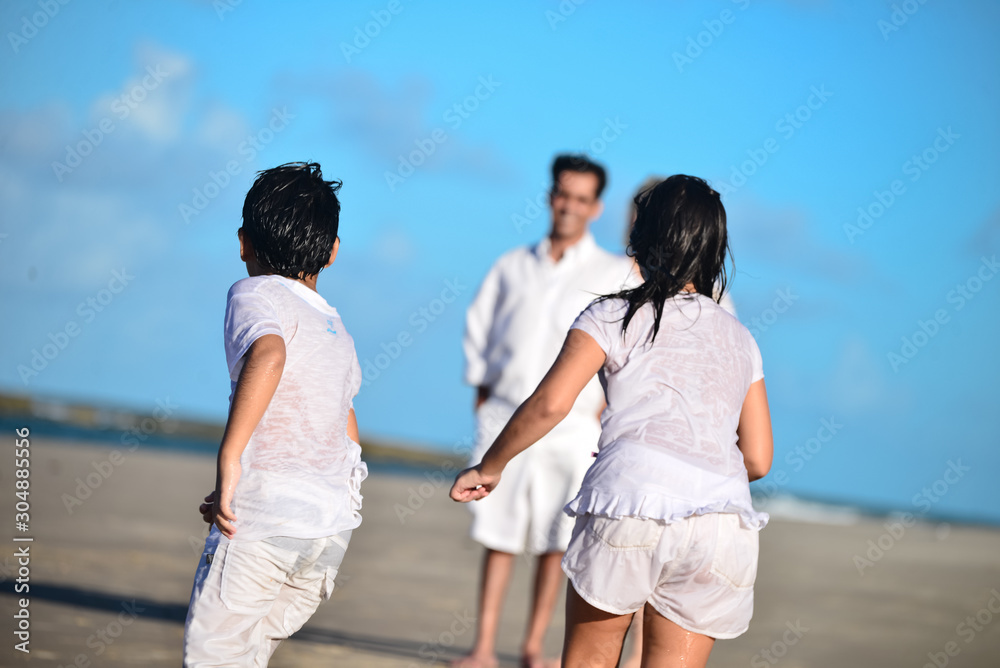 children running to father, Father's Day, children running on the beach ...