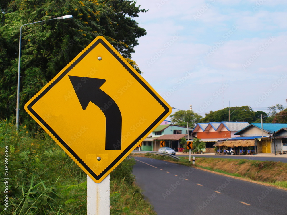 Traffic sign on the left curve on the post Traffic signs Be careful of ...