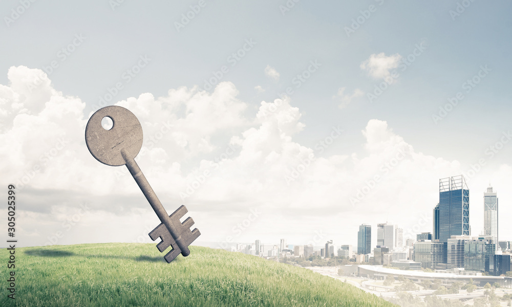 Conceptual background image of concrete key sign and natural landscape ...