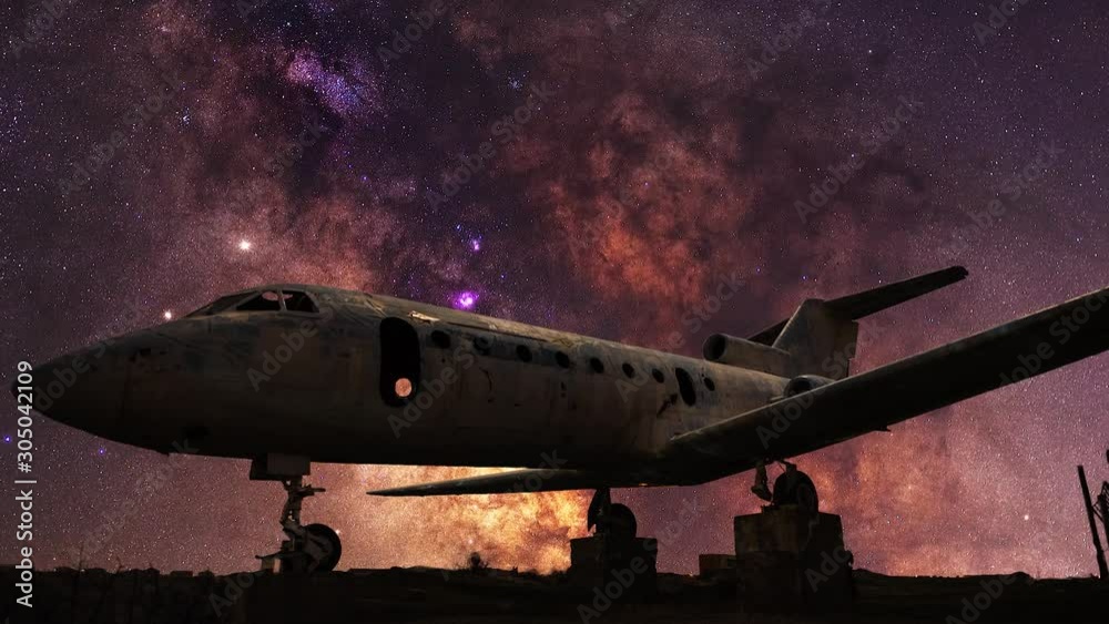 Close up milky way animation. Old airplane at the starry night and ...