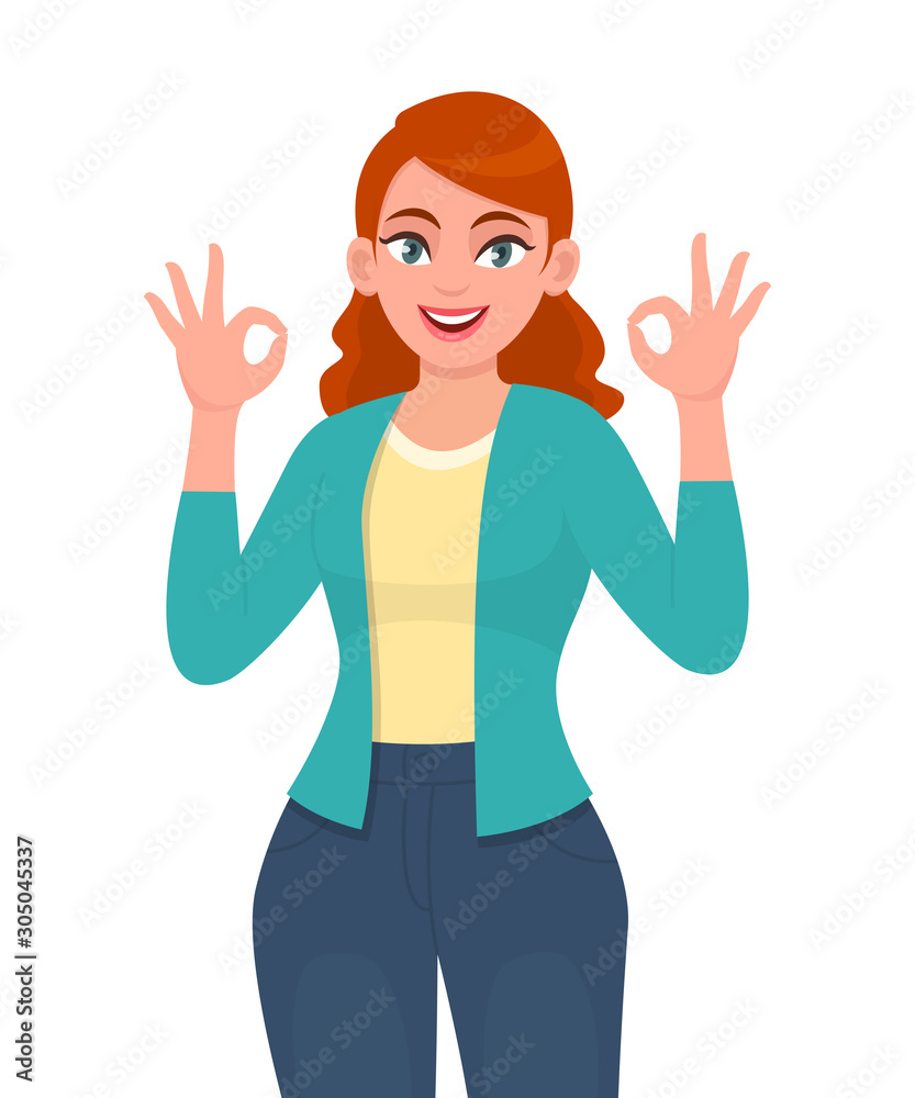 Trendy young woman showing okay sign. Smiling girl making OK or cool ...
