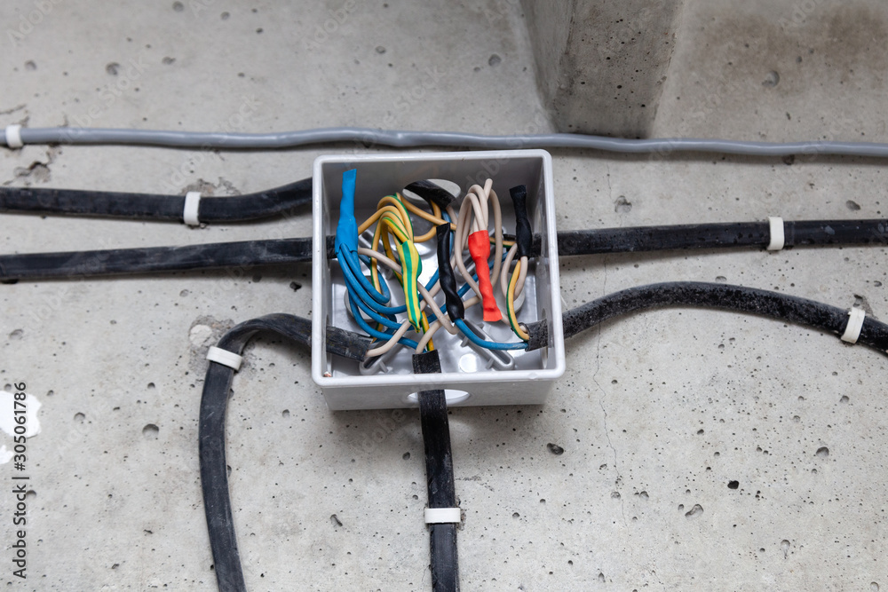 Cable laying ceiling. Electrical wires on wall. Wiring replacement ...