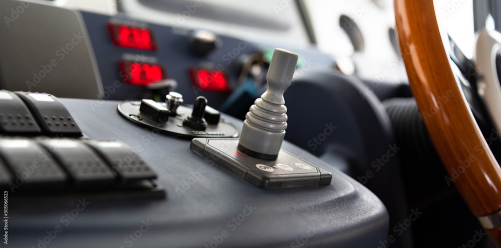 Instruments and gauges on dashboard used by a boat captain when ...