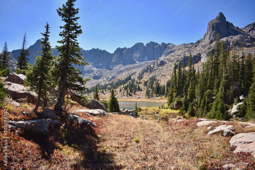 Beautiful alpine meadows and lakes amidst the rugged Gore Range in the ...