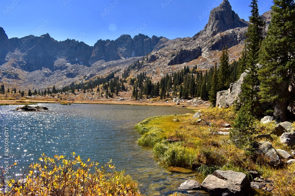 Beautiful alpine meadows and lakes amidst the rugged Gore Range in the ...