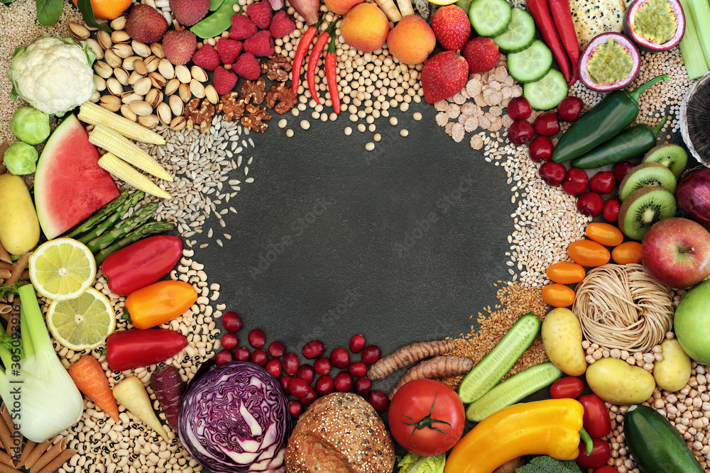 Vegan health food border with a large collection of foods. High in ...