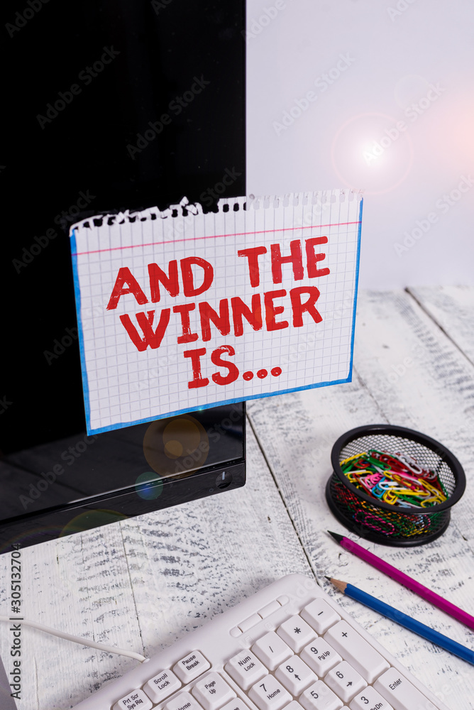 Writing note showing And The Winner Is. Business concept for Announcing ...