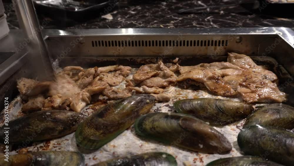 Cook the meat on a grill and make it tender for the taste as desired ...