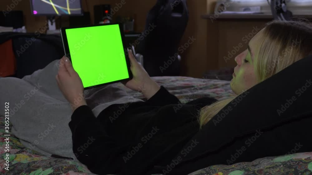 Woman Lying on Couch at Home Watching Tablet Green Screen Stock Video ...