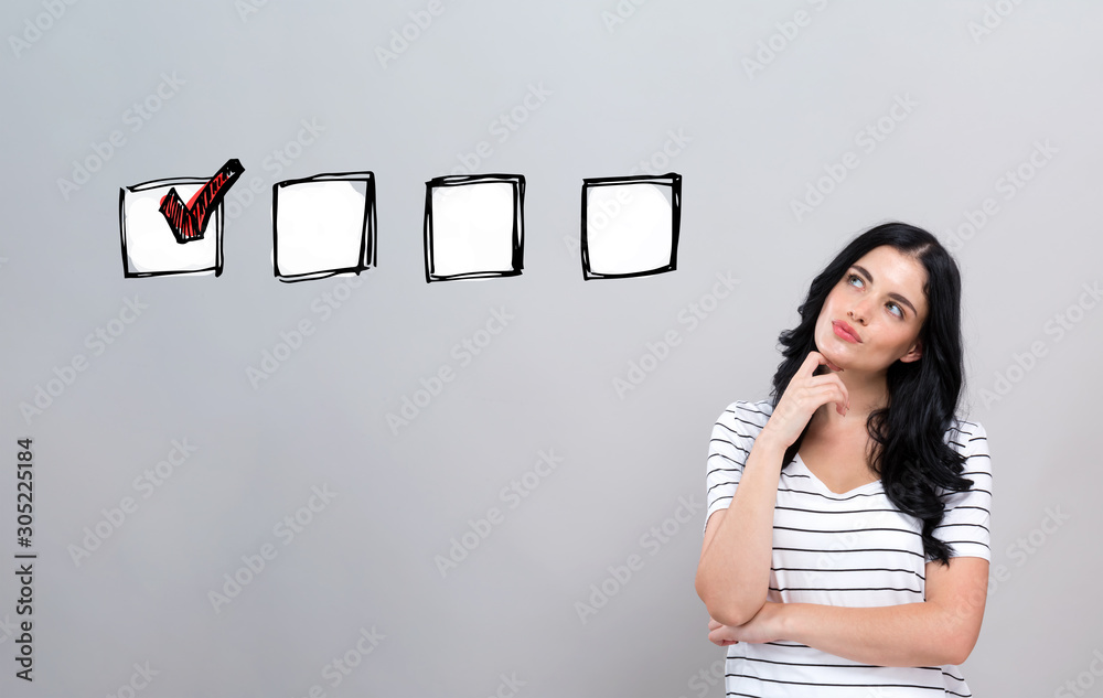 Checklist with young woman in a thoughtful face Stock Photo | Adobe Stock