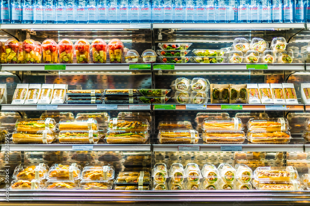 Pre-packaged foods displayed in a commercial refrigerator Stock Photo ...