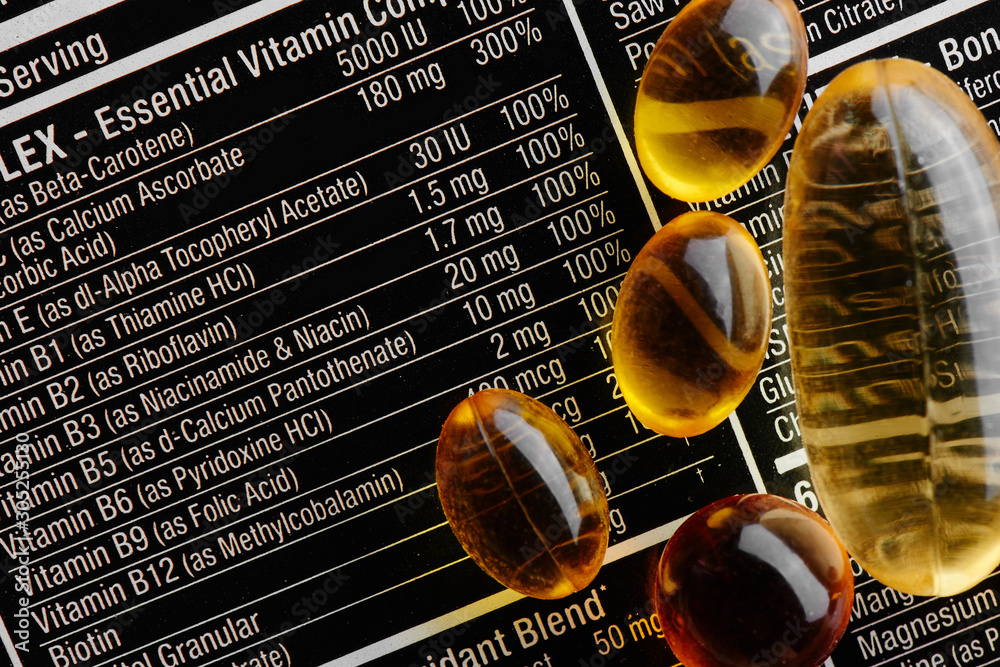 Close-up of a black label with supplements facts of a multivitamin ...