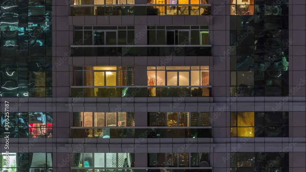Night view of exterior apartment building timelapse. High rise ...