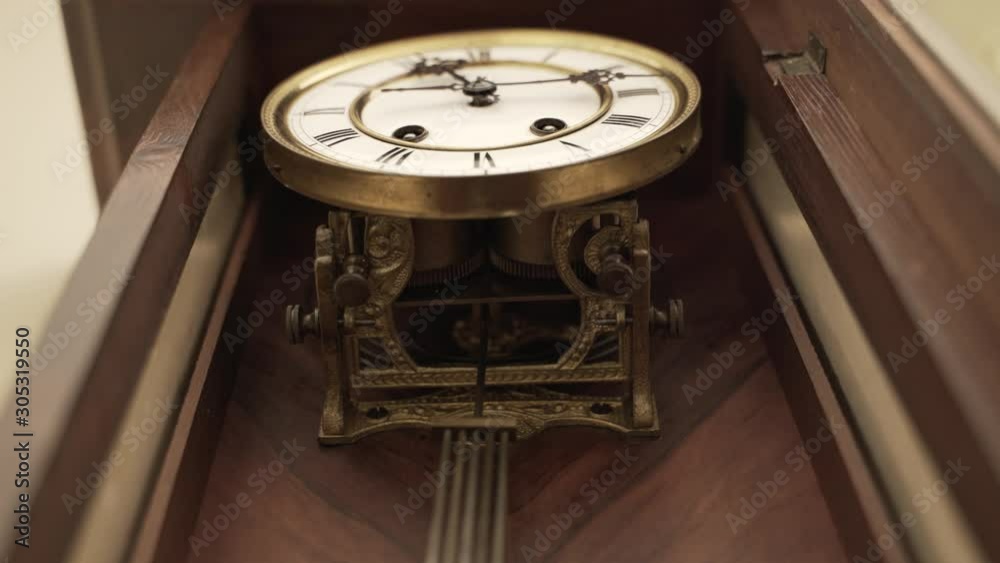 Clockwork Mechanics of Old Wooden Wall Clock Stock Video | Adobe Stock