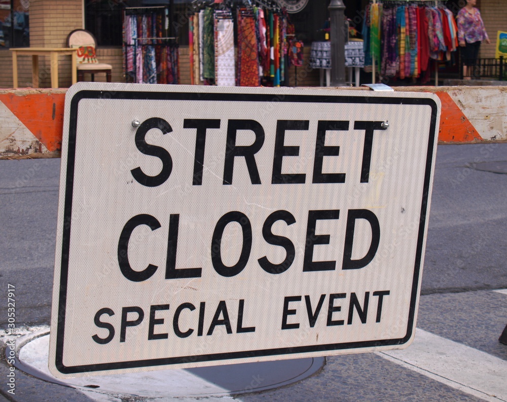 Sign says Street Closed Special Event with st fair in background Stock ...