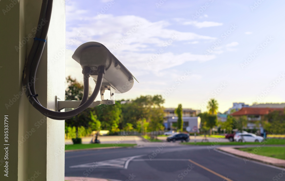 CCTV camera security at outdoor parking lot. With copy space for text ...