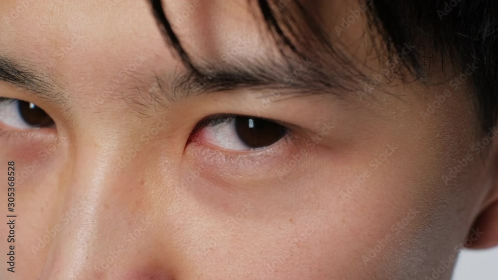 Serious face look man on the background. Asian serious handsome people ...