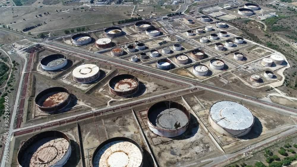 Aerial of empty oil depots sometimes called tank farm installation or ...