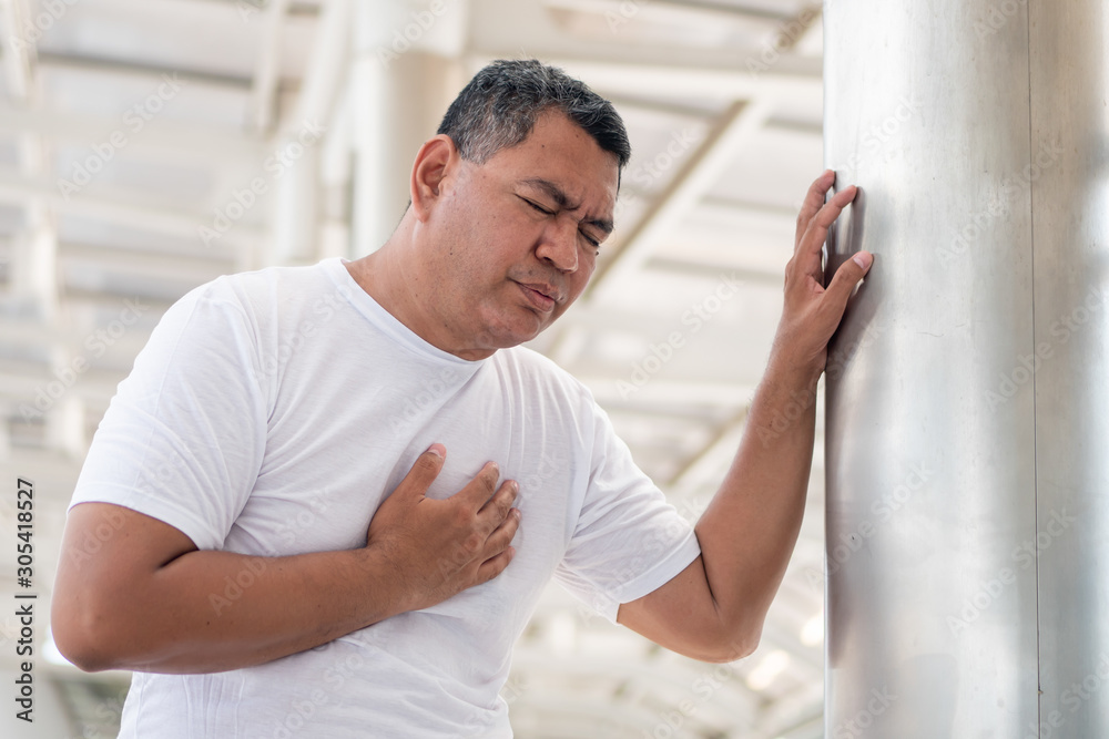 sick old senior man suffering from heart attack, cardiac arrest, lung ...