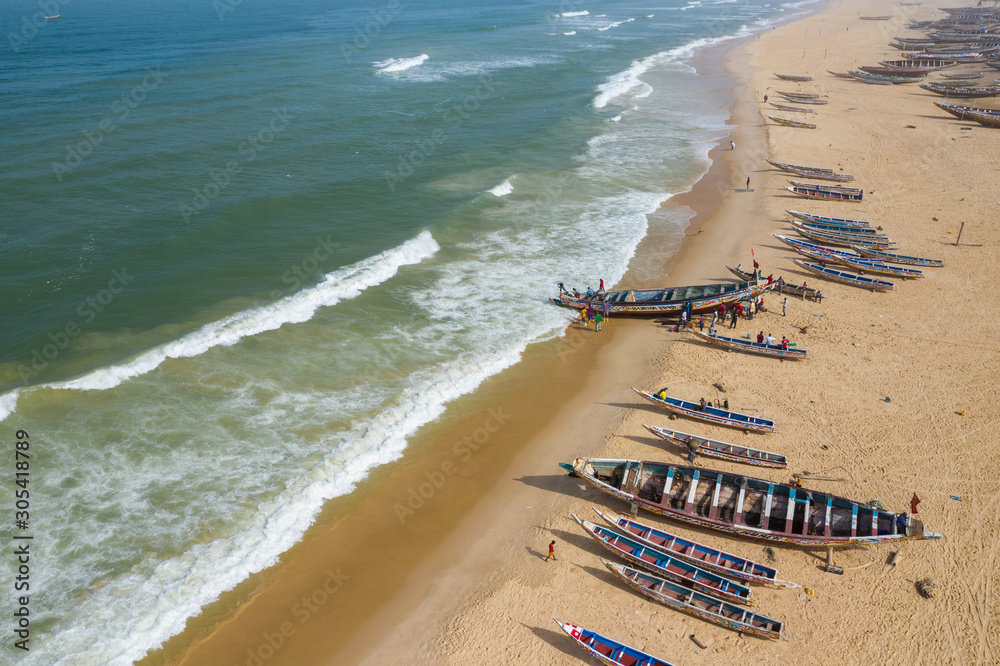 Aerial view of fishing village, pirogues fishing boats in Kayar ...