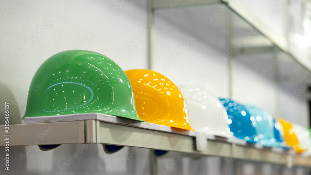 Lots of safety helmet engineering construction worker equipment on ...