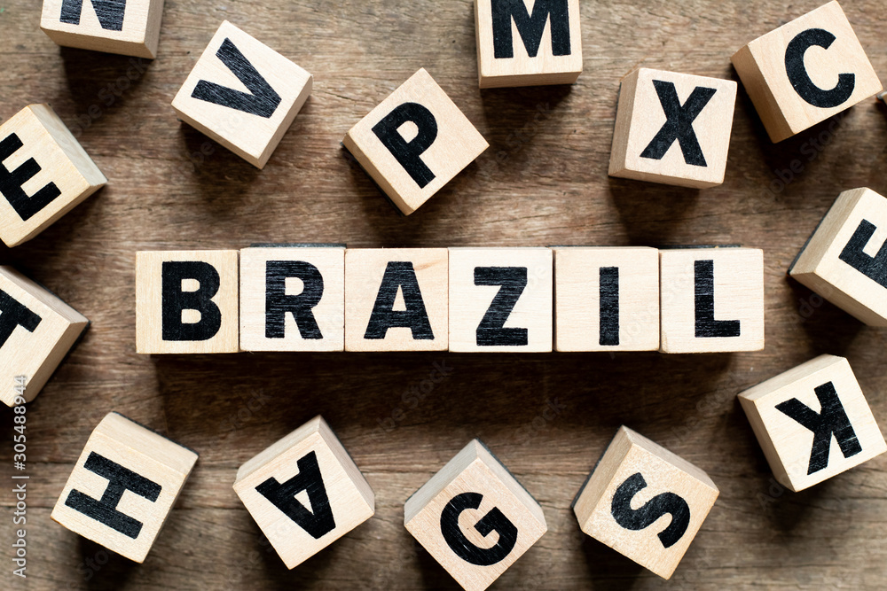 Letter block with word Brazil on wood background with another alphabet ...