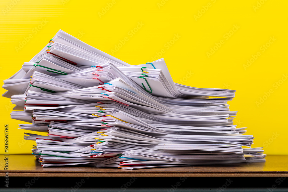 Stack overload document report paper. Stock Photo | Adobe Stock